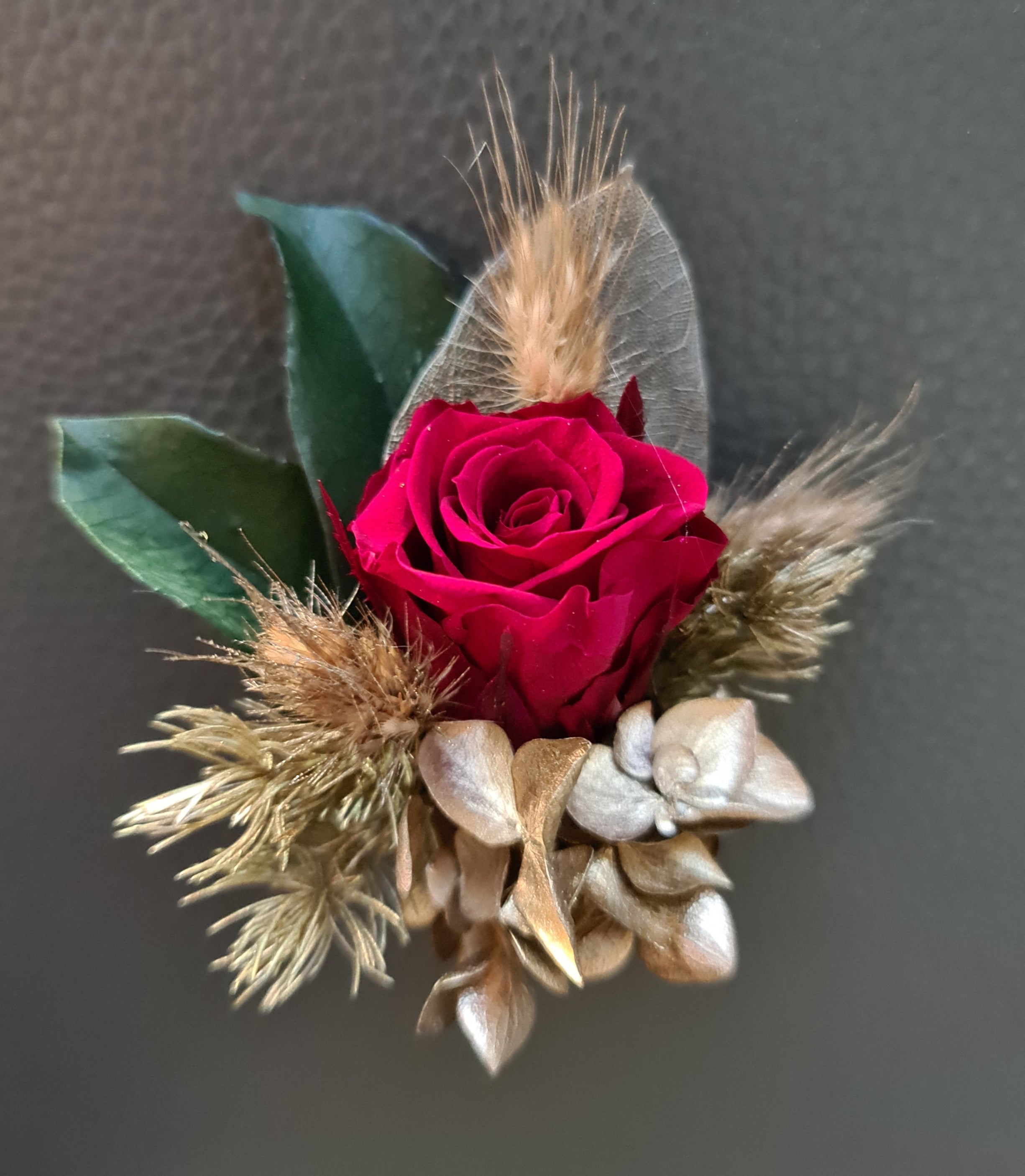Everlasting flowers wedding buttonhole – red, green & gold – Amazing ...
