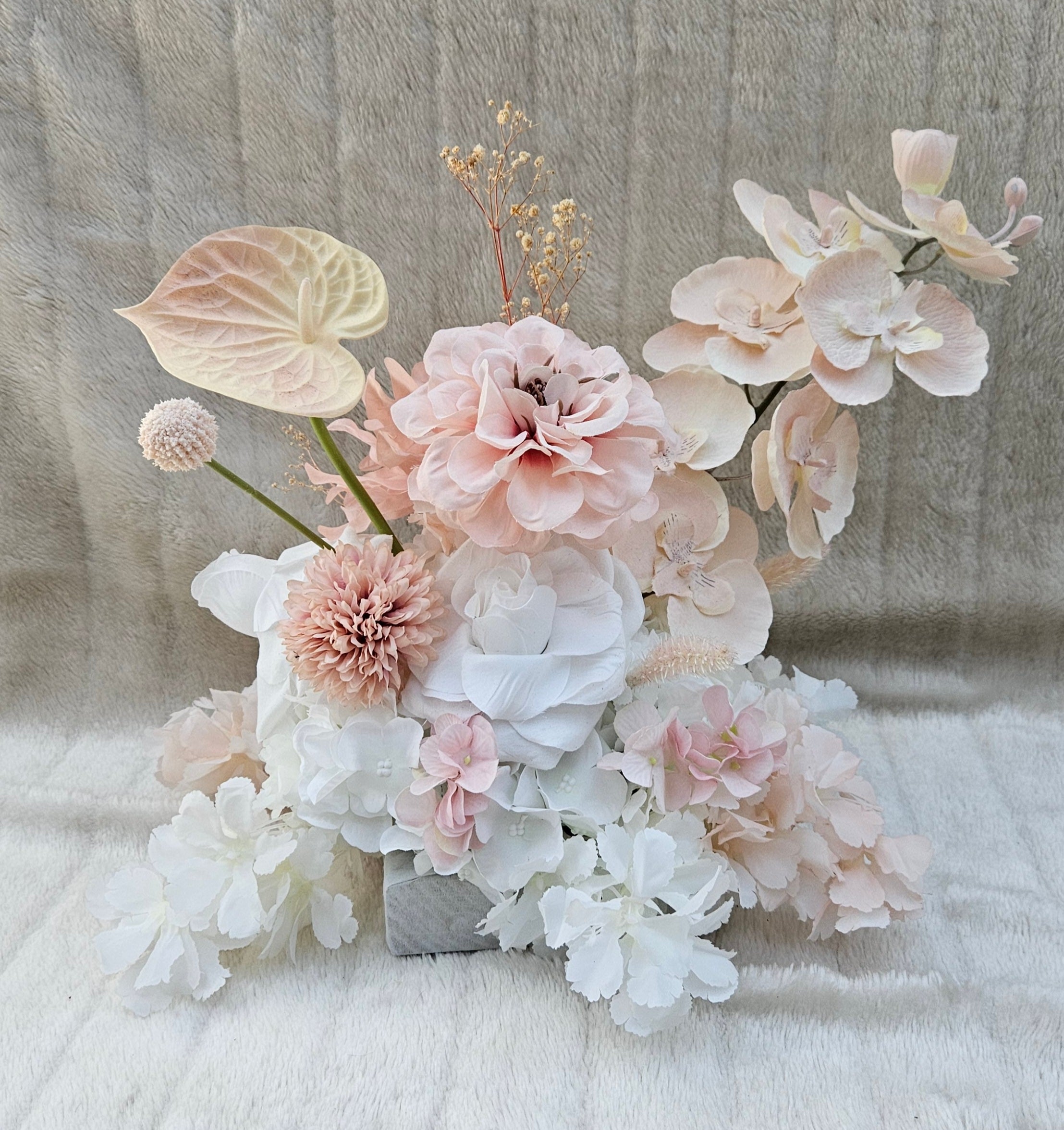 Everlasting blush and neutral wedding signing table flowers - Centrepi ...